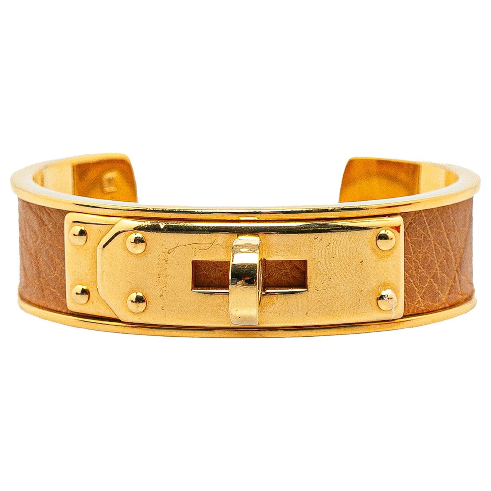 Hermès Gold Kelly Bangle Metal Pony-style calfskin ref.1356983 - Joli ...