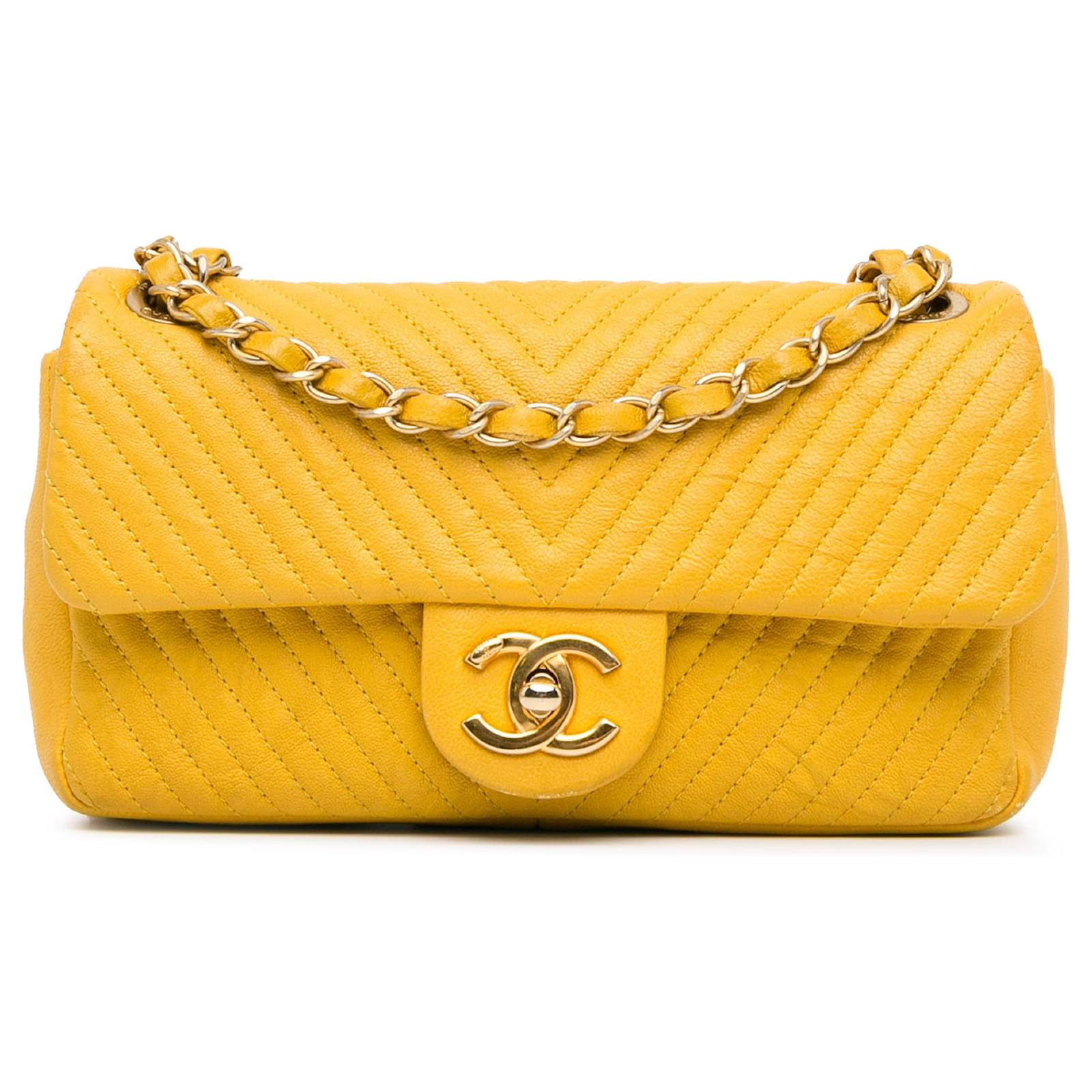 Chanel Yellow Medium Wrinkled Calfskin Chevron Medallion Charm Surpique ...