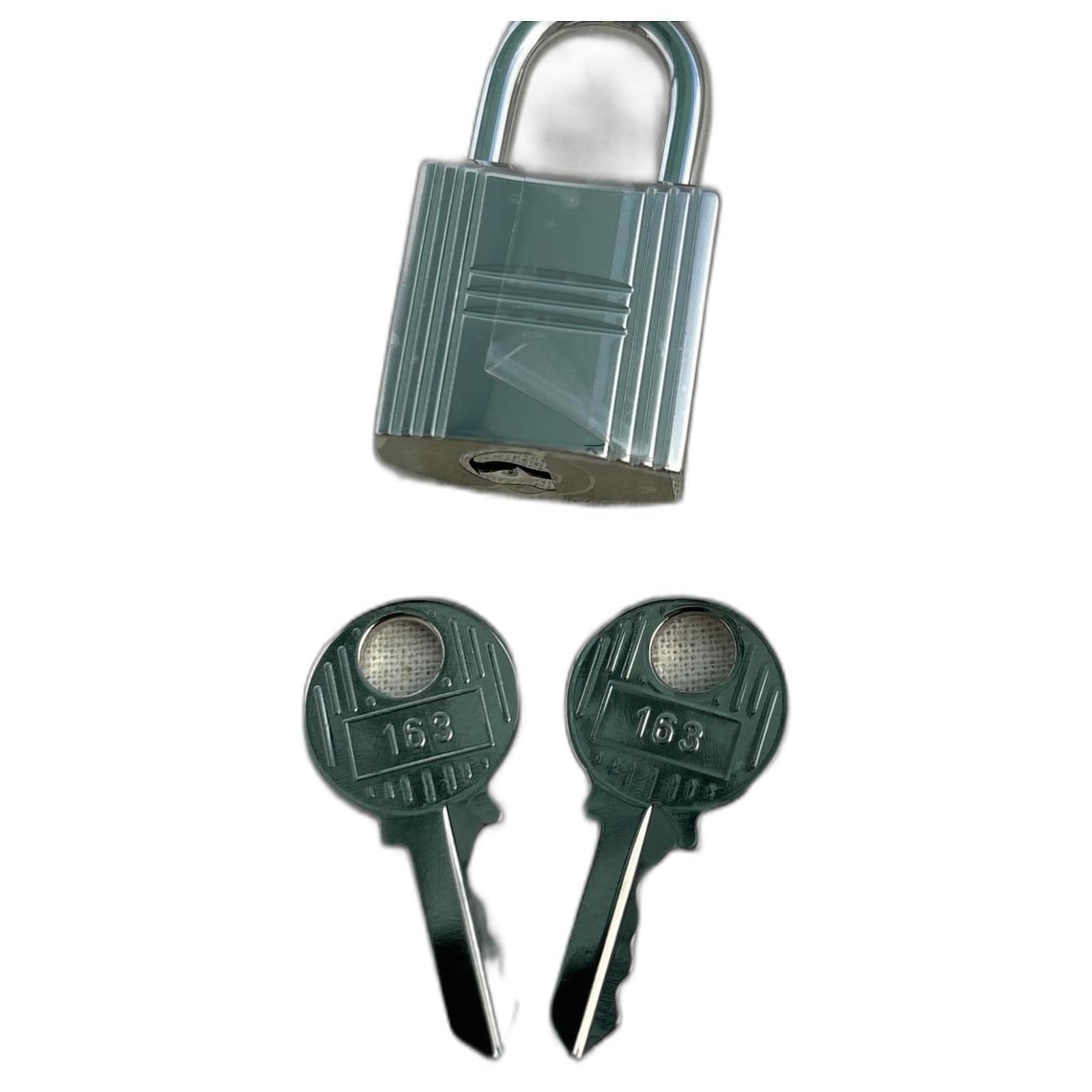 Brand new Hermès Kelly, Birkin padlock. Silver hardware Steel ref ...