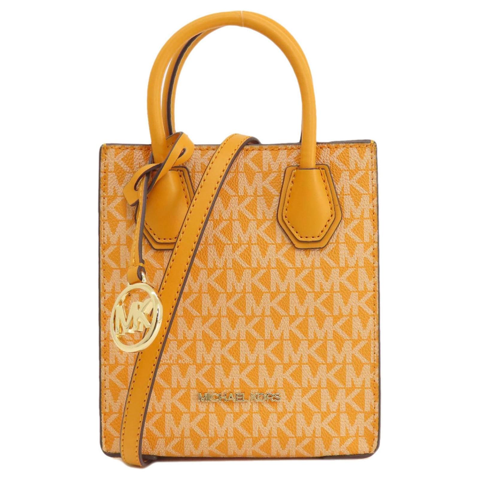 Michael Kors Mercer Yellow Cloth ref.1408920 - Joli Closet