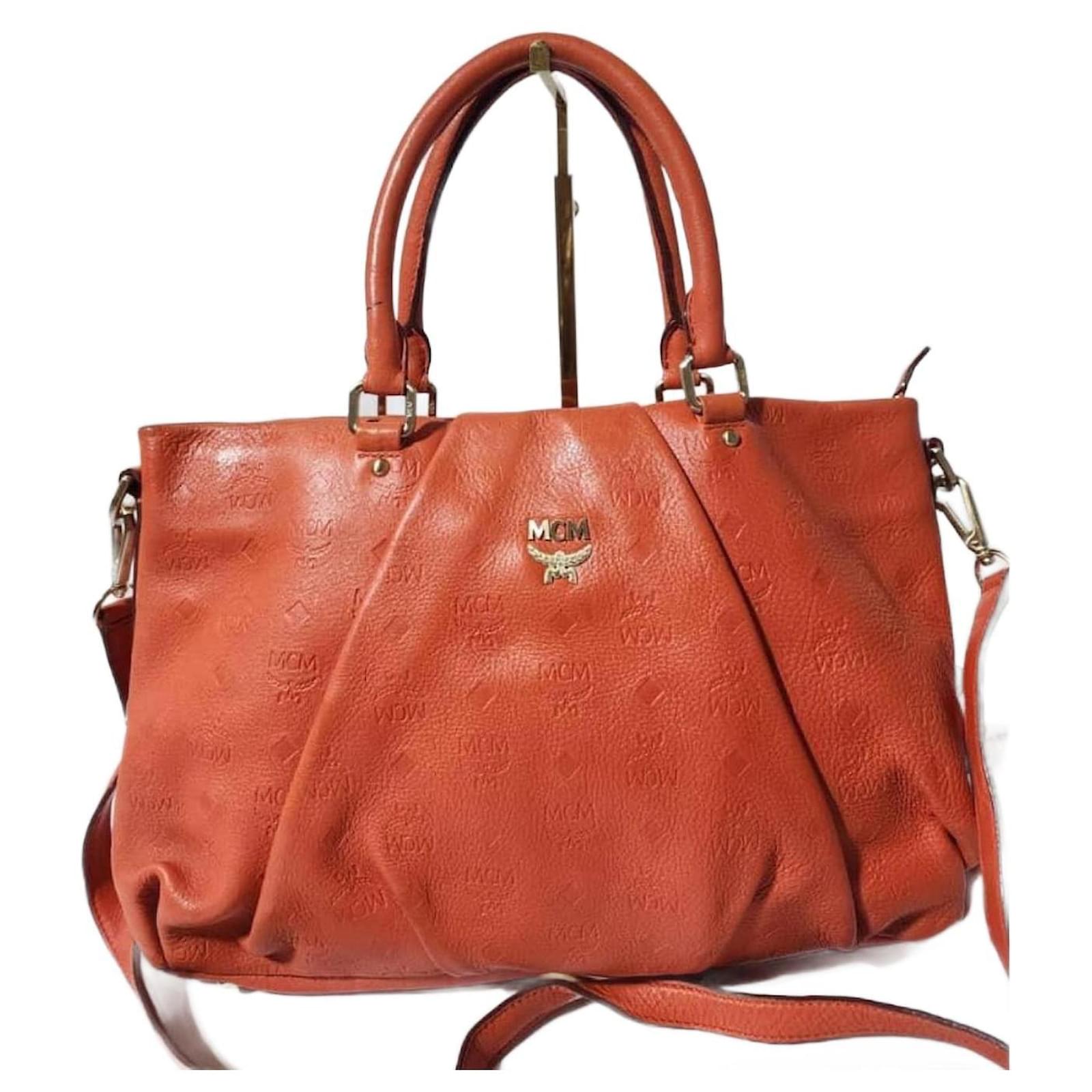MCM Embossed Glam 2 Way Leather Satchel Bag Orange ref.1628322 - Joli ...
