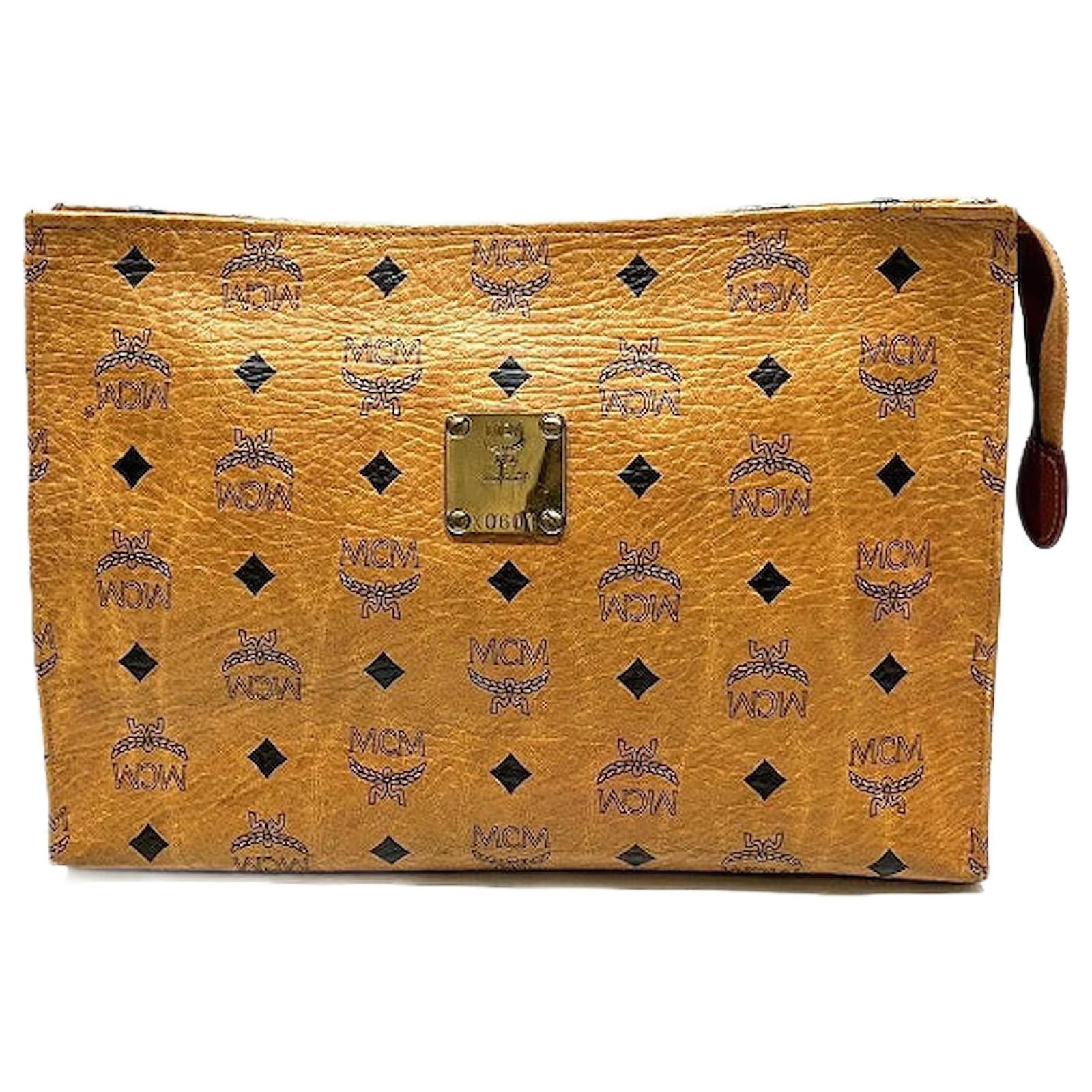 MCM Brown Leather Logo Clutch Bag ref.1800187 - Joli Closet