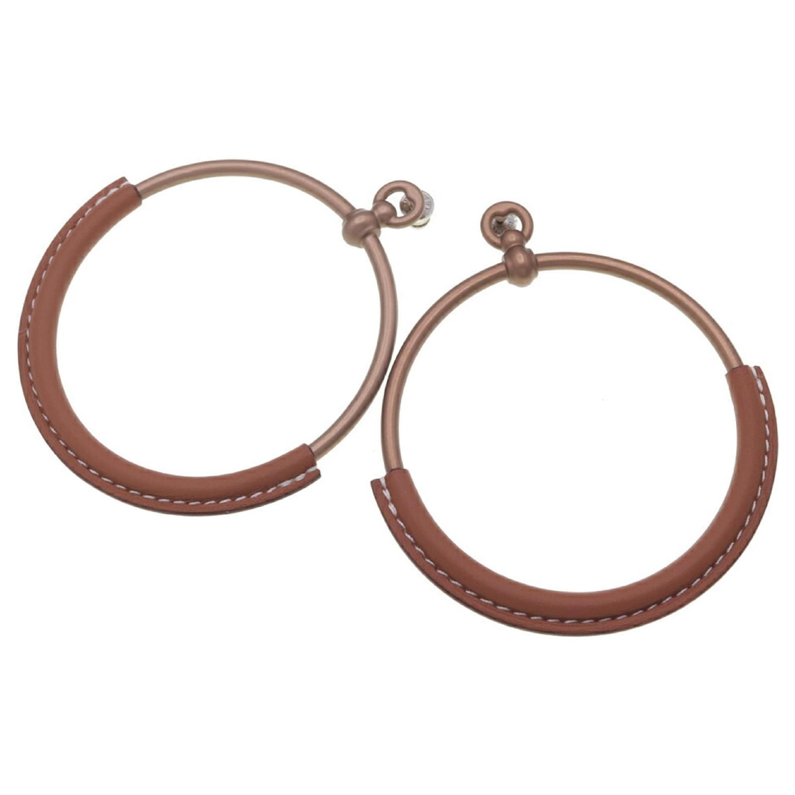 Hermès Hermes Gold Hoop Earrings Golden Leather ref.1846458 - Joli Closet