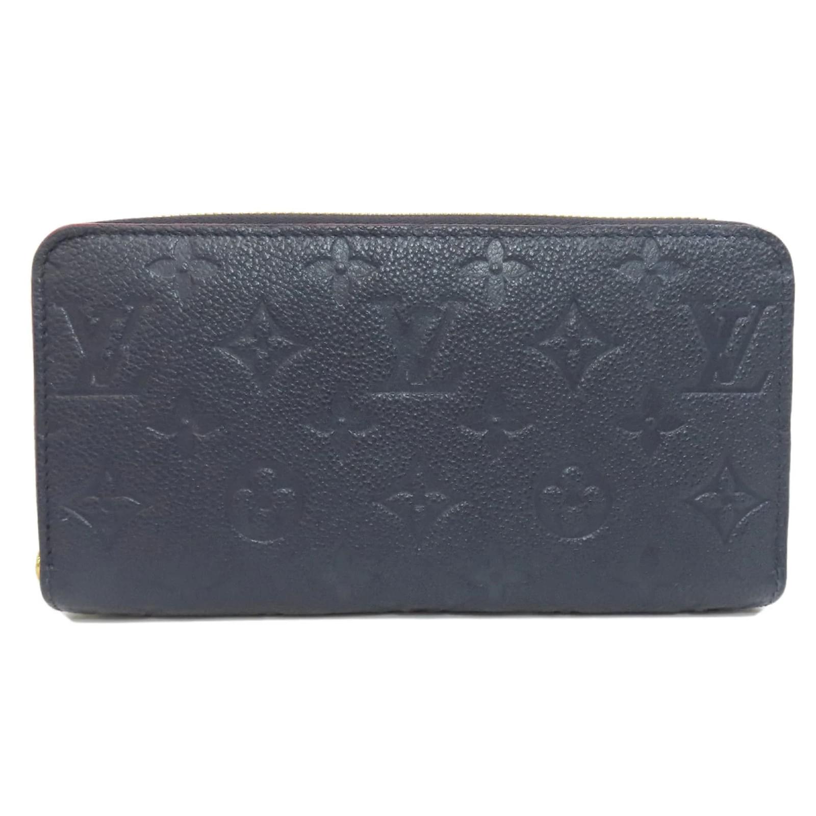 Zippy Louis Vuitton Empreinte Long Wallet Red Cloth ref.1874902 - Joli ...