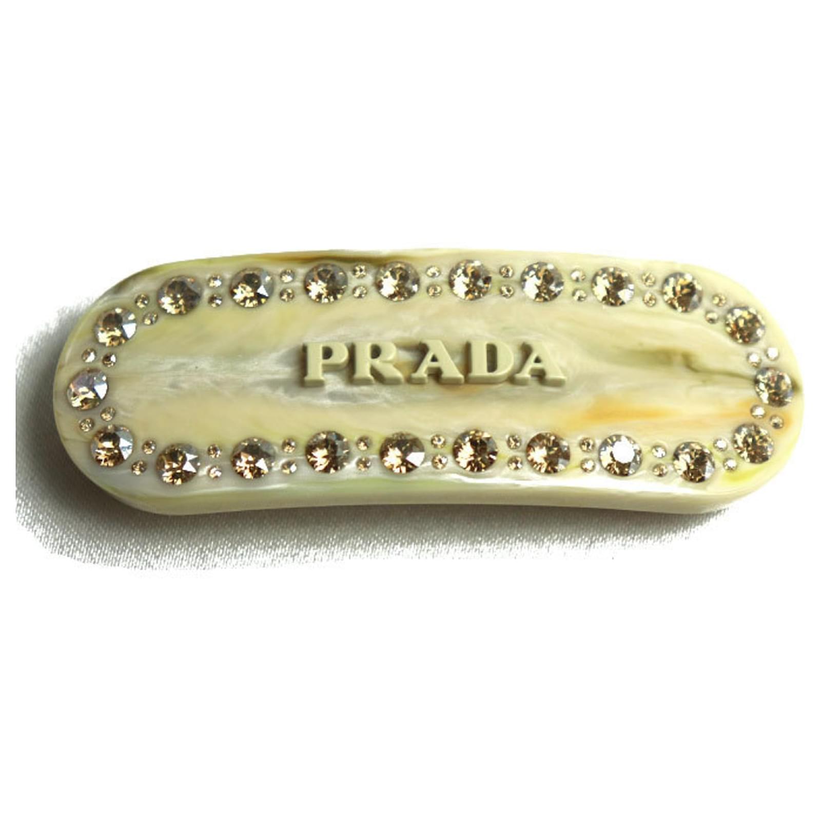 Prada Resin and Gold Plated Barrette Cream Gold-plated ref.1881142 ...