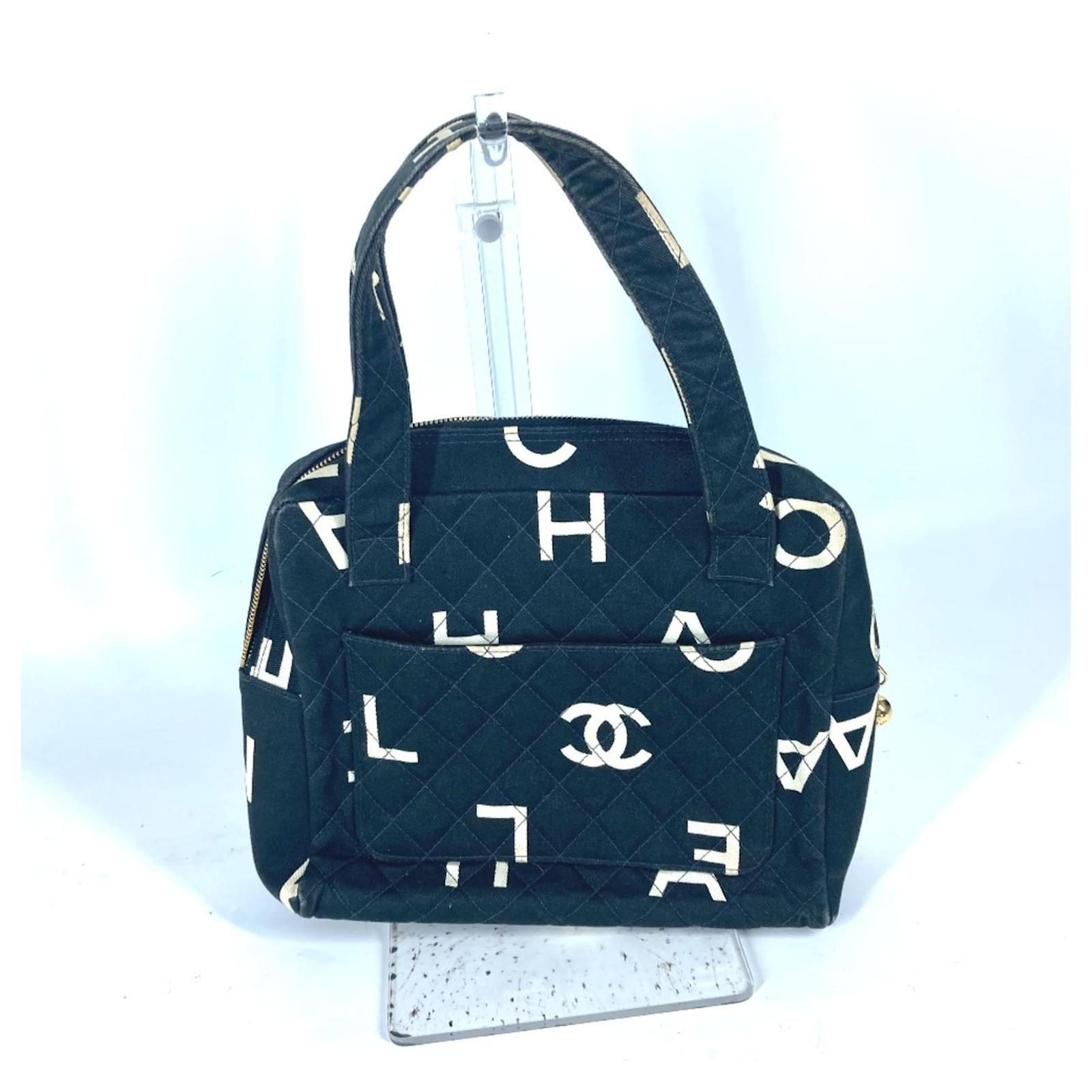 Chanel CC Handbag in Black Canvas White Cloth ref.1887015 - Joli Closet