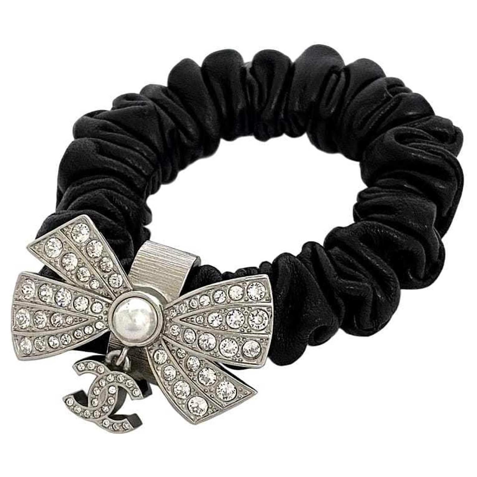 Chanel Black Leather Scrunchie with Rhinestone Charm ref.1985906 - Joli ...