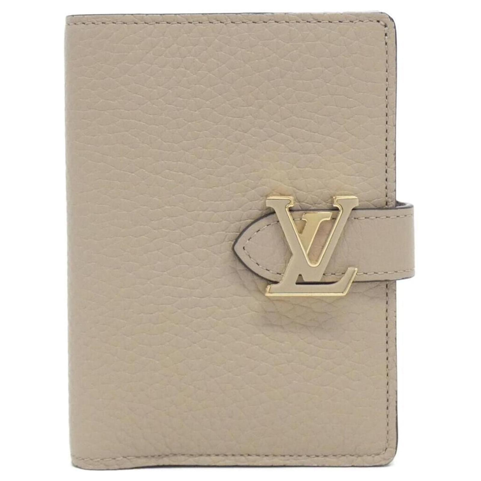 Louis Vuitton Taurillon LV Vertical CP Wallet Leather ref.1992137 - Joli Closet
