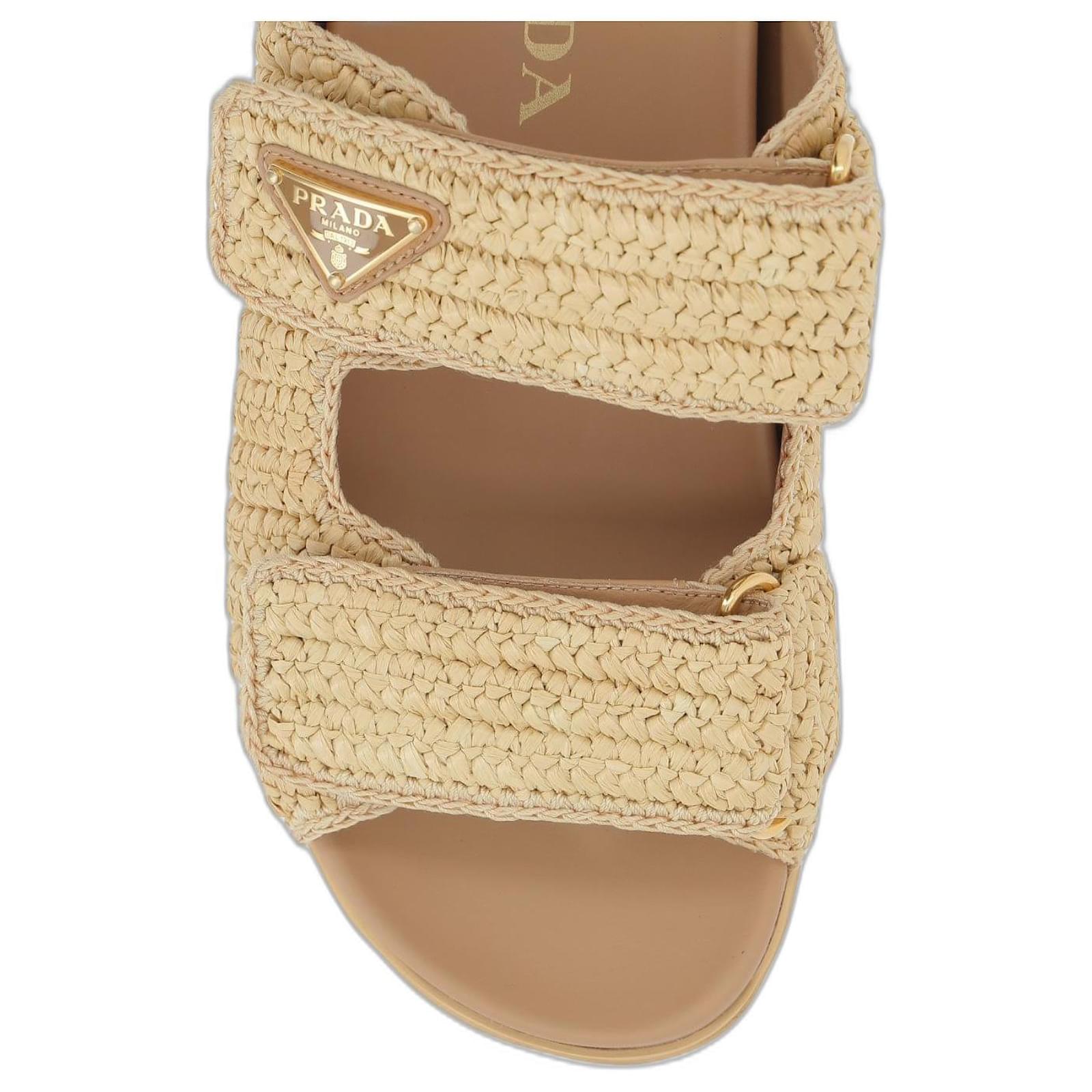 Flat sandal by Prada made of natural colored synthetic raffia Beige ...