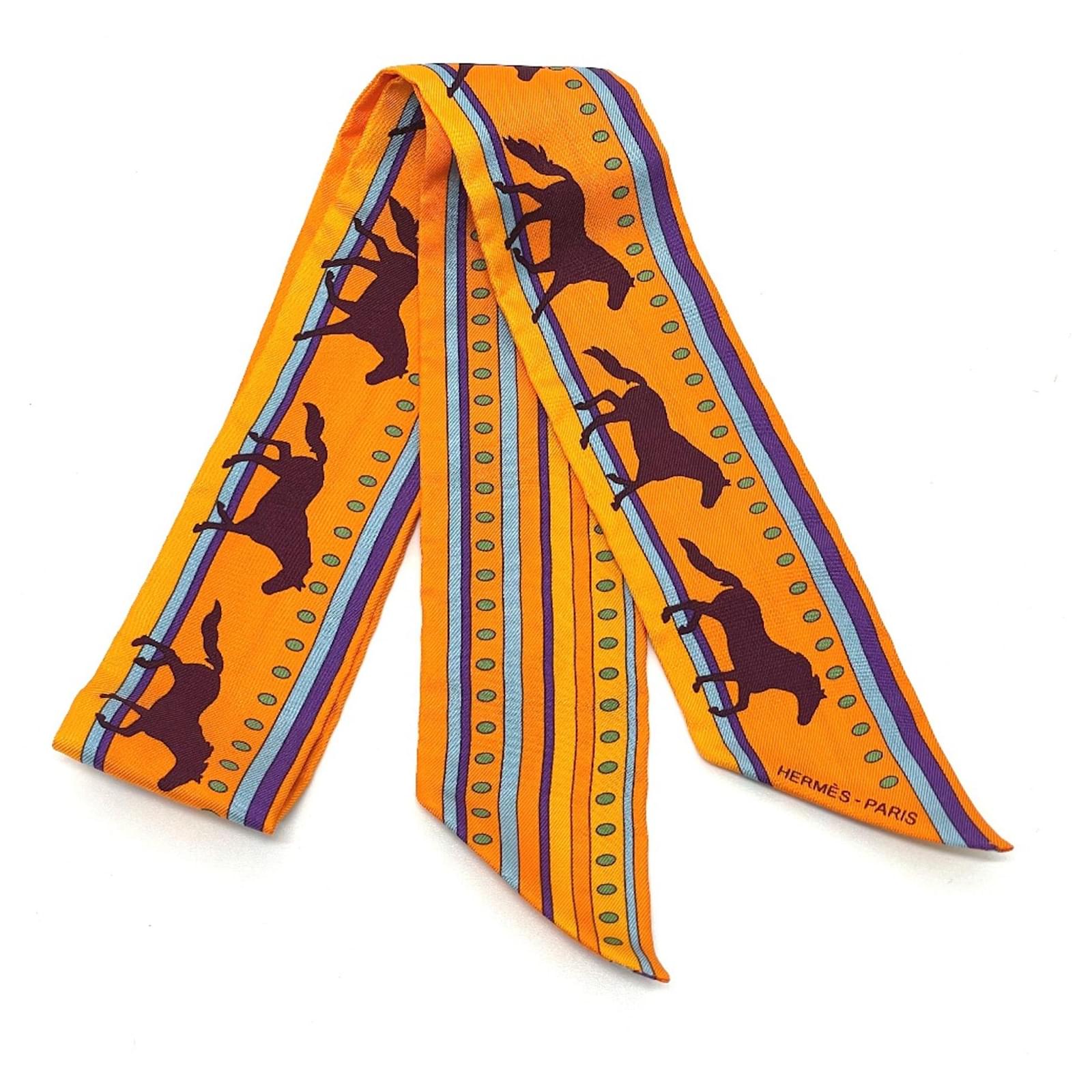 Hermès Hermes Horse Twilly Scarf in Orange Cloth ref.2051320 - Joli Closet