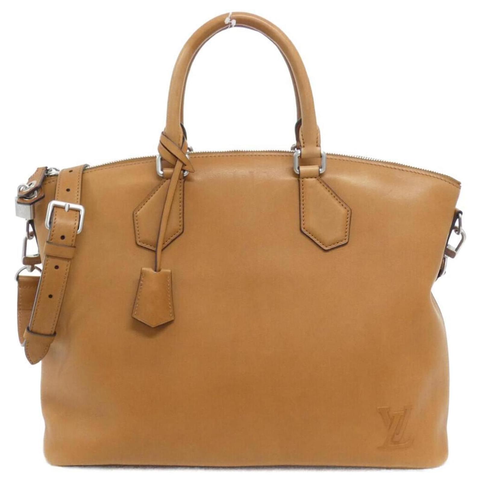 Louis Vuitton Lock It MM Handbag Brown ref.2172290 - Joli Closet