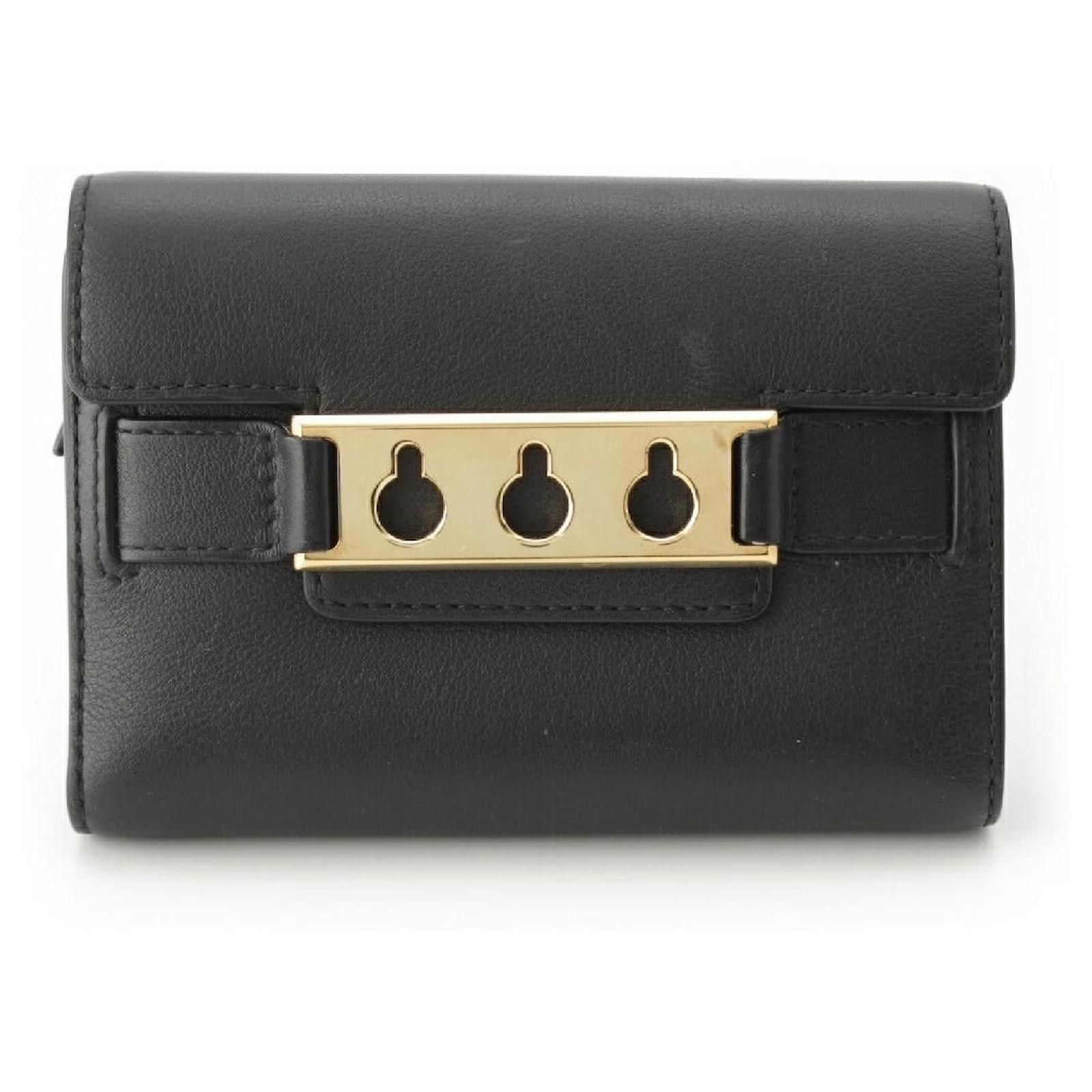 Delvaux Tempete Compact Wallet Black Leather Pony-style calfskin ref ...
