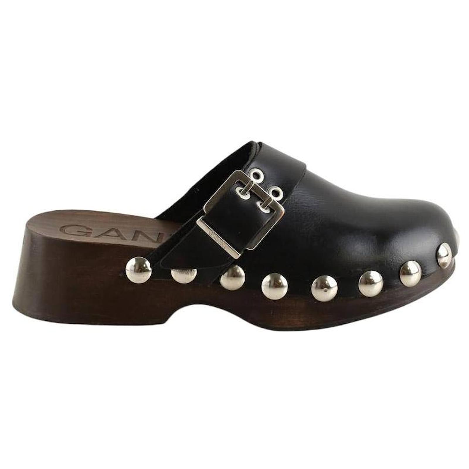 Ganni Black leather clogs ref.2243206 - Joli Closet