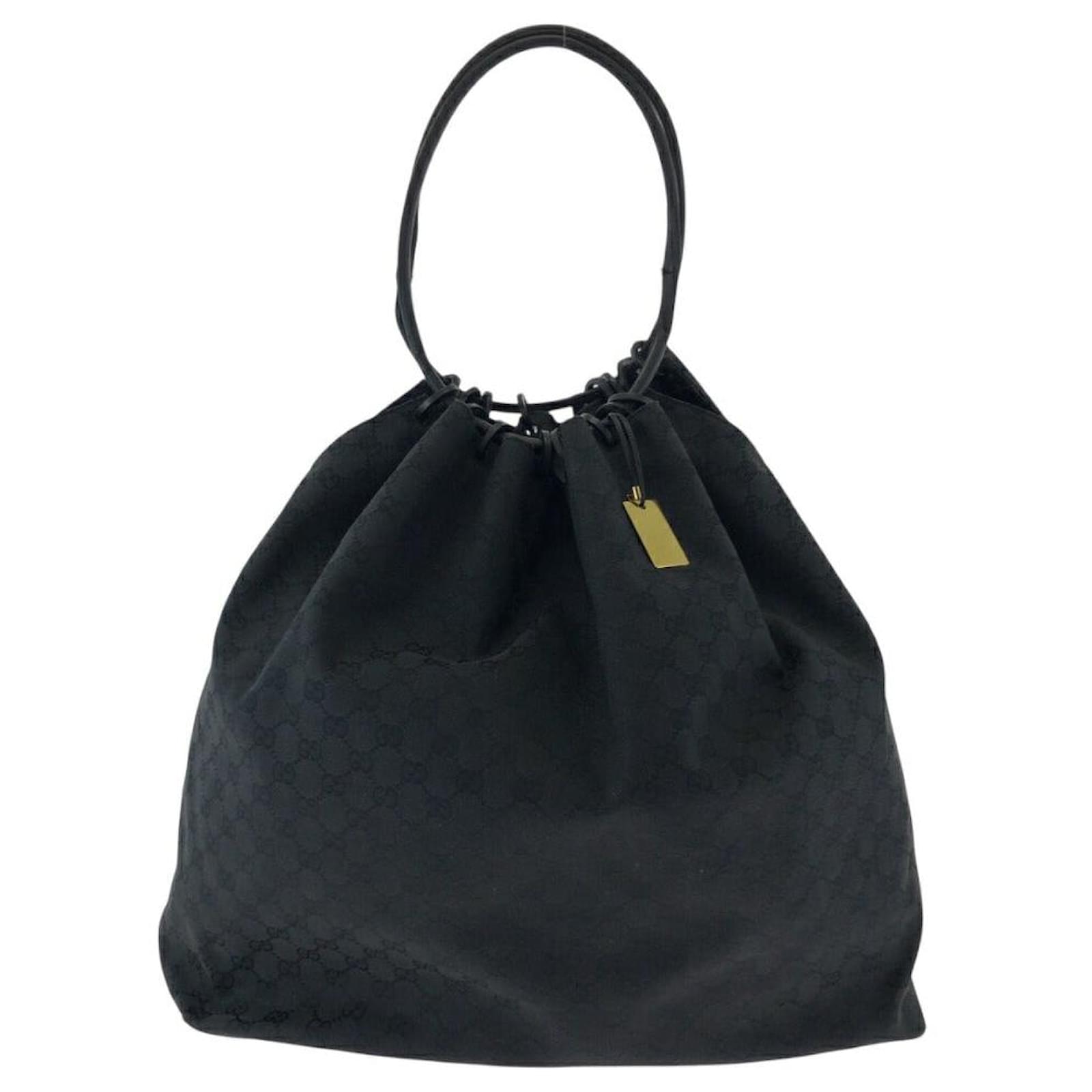 Gucci GG Canvas Drawstring Shoulder Bag Black Cloth ref.2465544 - Joli ...