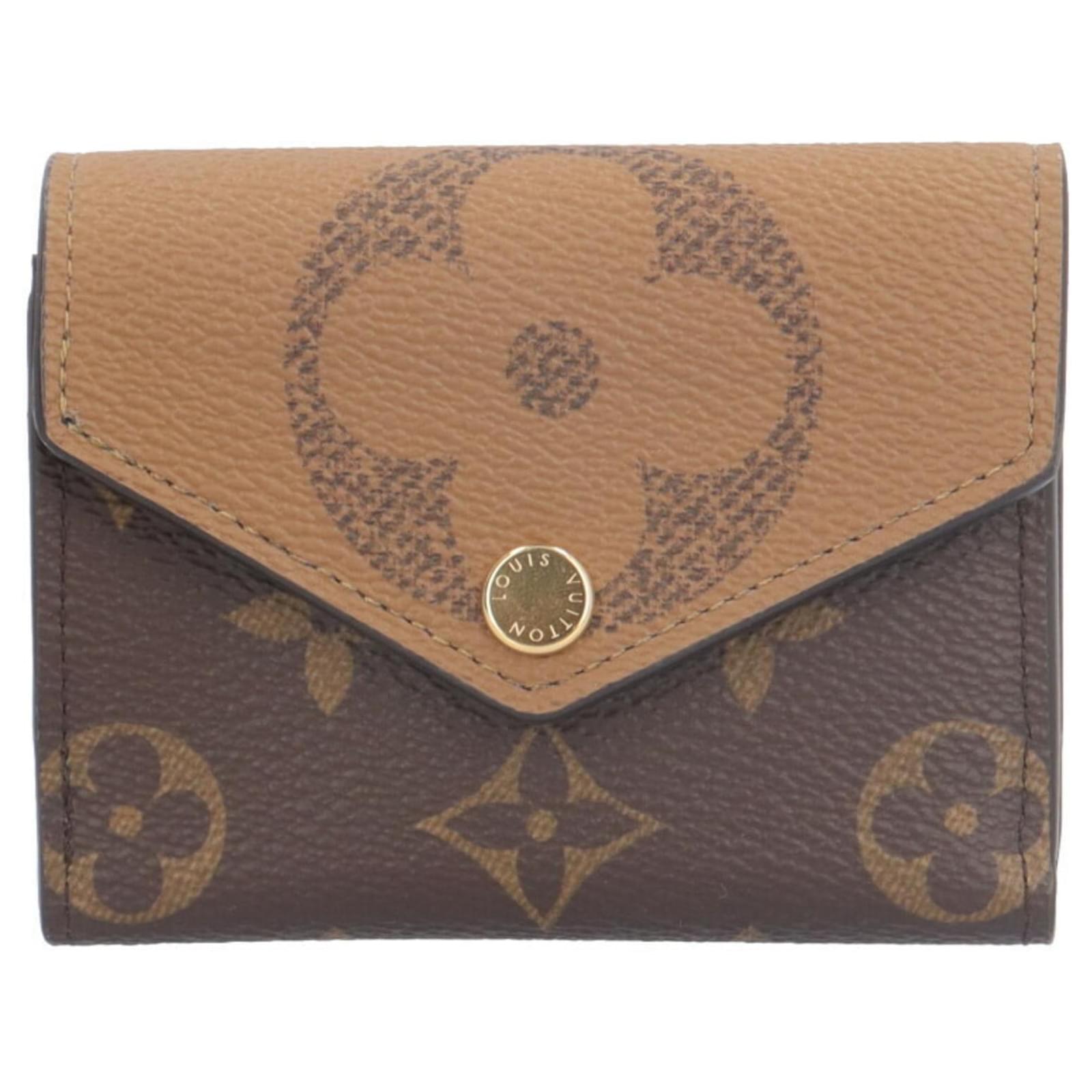 Louis Vuitton Portefeuille Zoe Monogram Giant Reverse Trifold Wallet ...