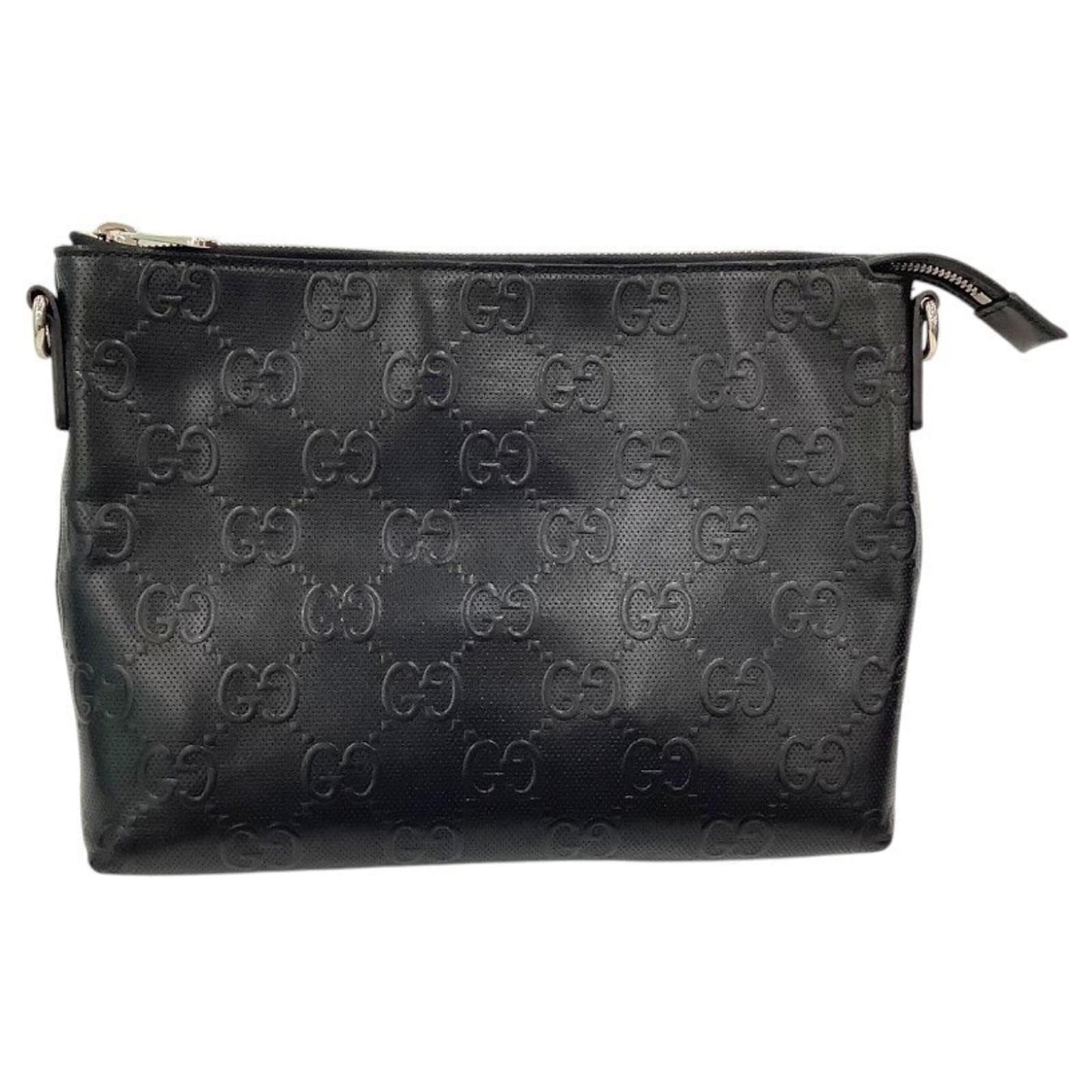 Gucci GG Embossed Medium Black Clutch Bag Leather ref.2588546 - Joli Closet