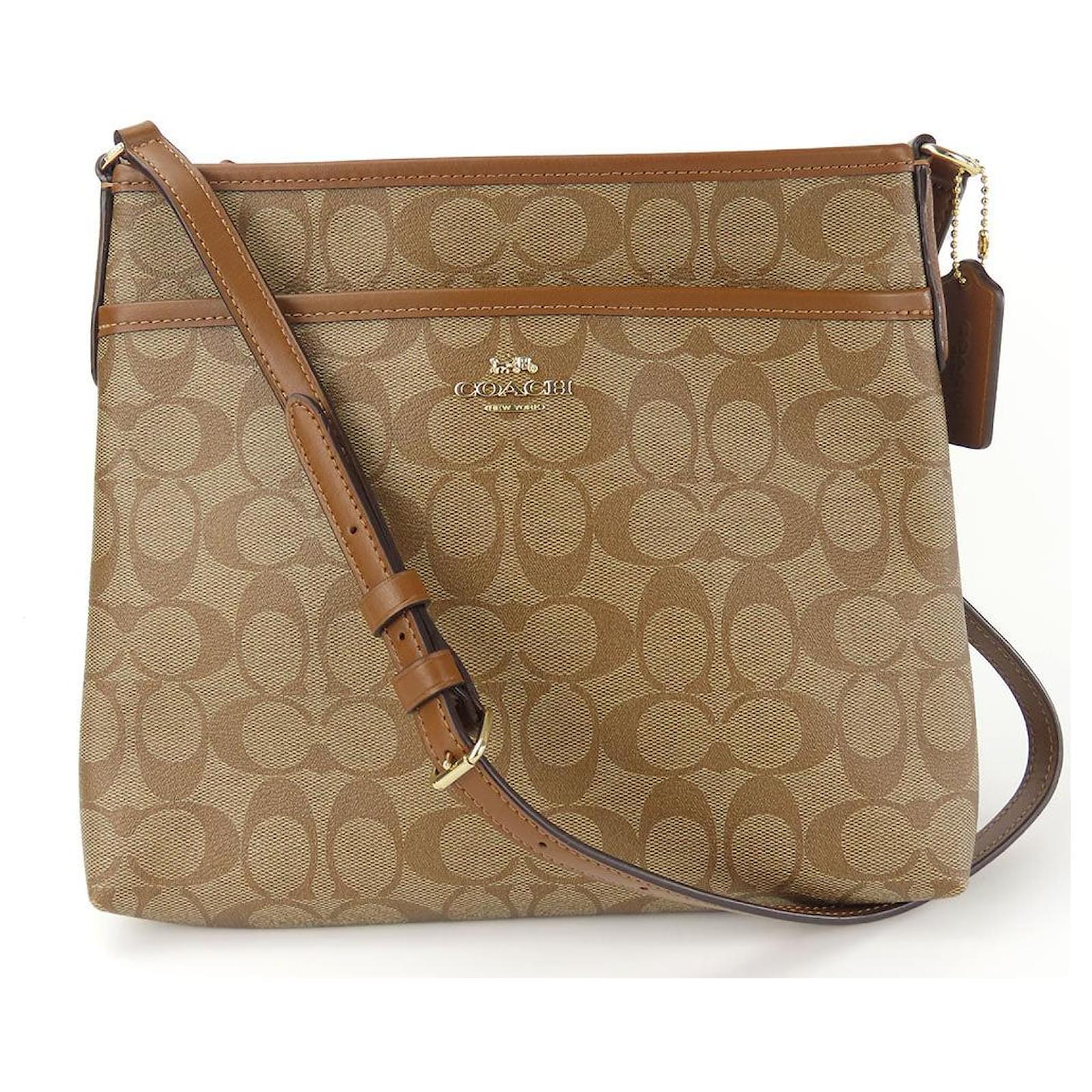 Coach Signature PVC Shoulder Bag Brown Cloth ref.2634773 - Joli Closet