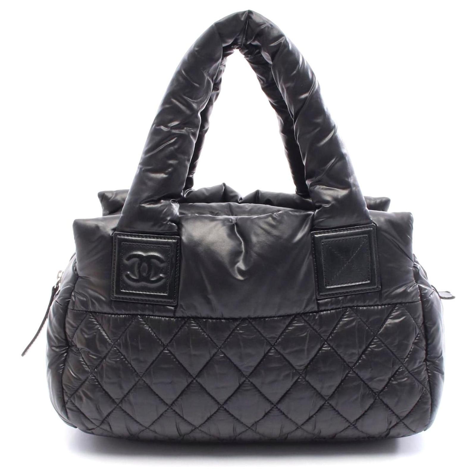 Chanel Nylon Leather Coco Cocoon Handbag Black ref.2725879 - Joli Closet